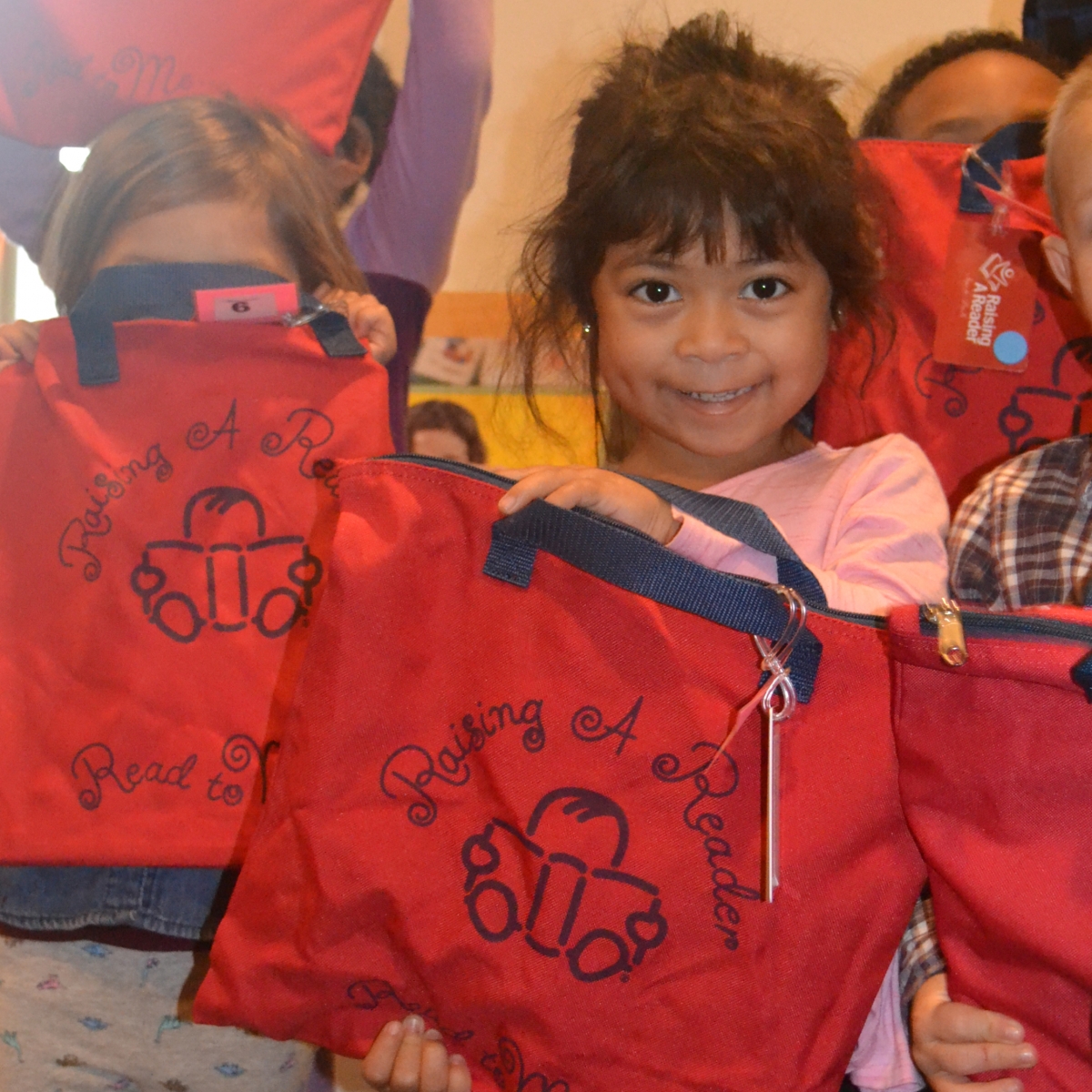 Kids start the Raising A Reader program! – Child Care Action Council